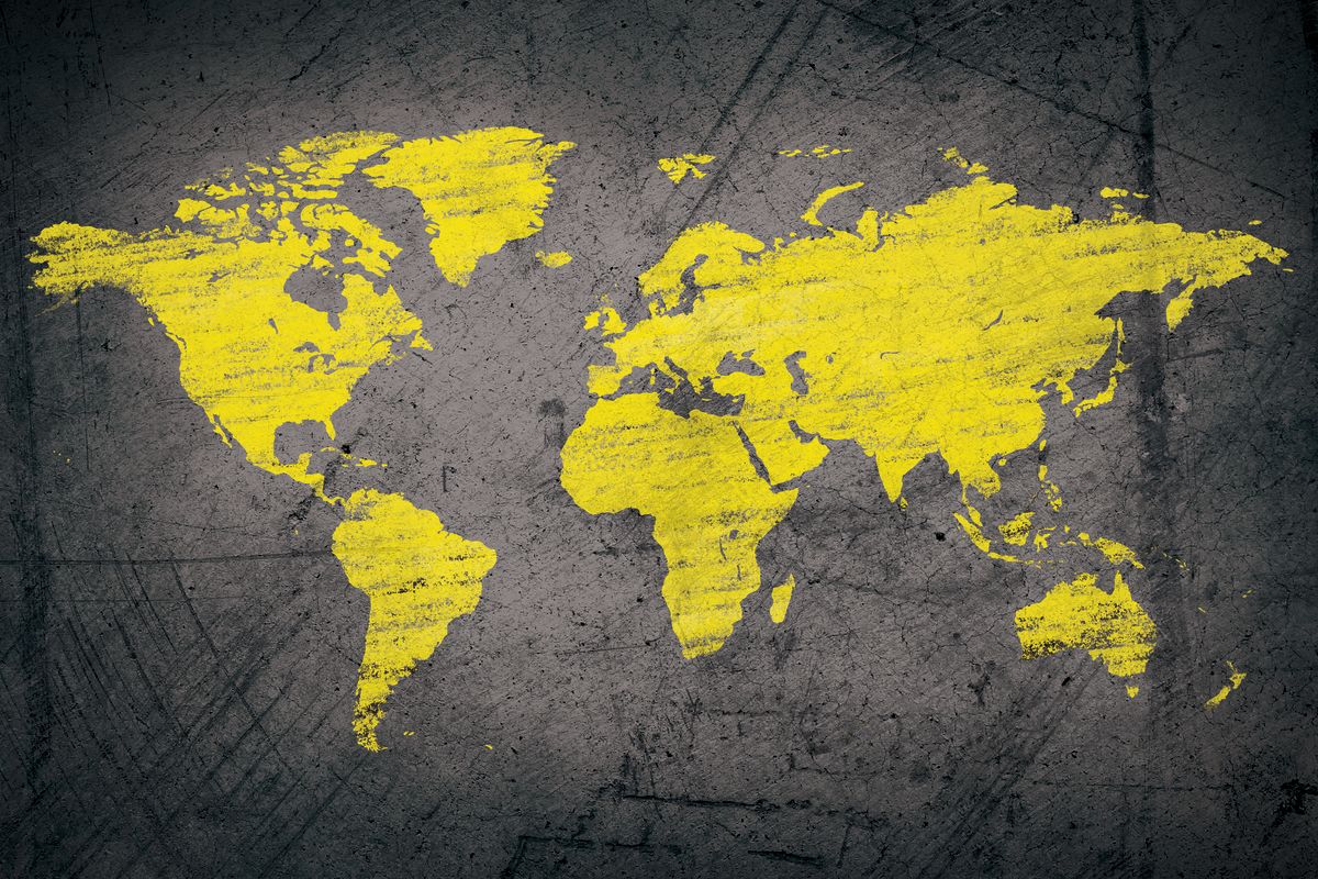 Grunge Yellow World Map – Pineapple Licensing